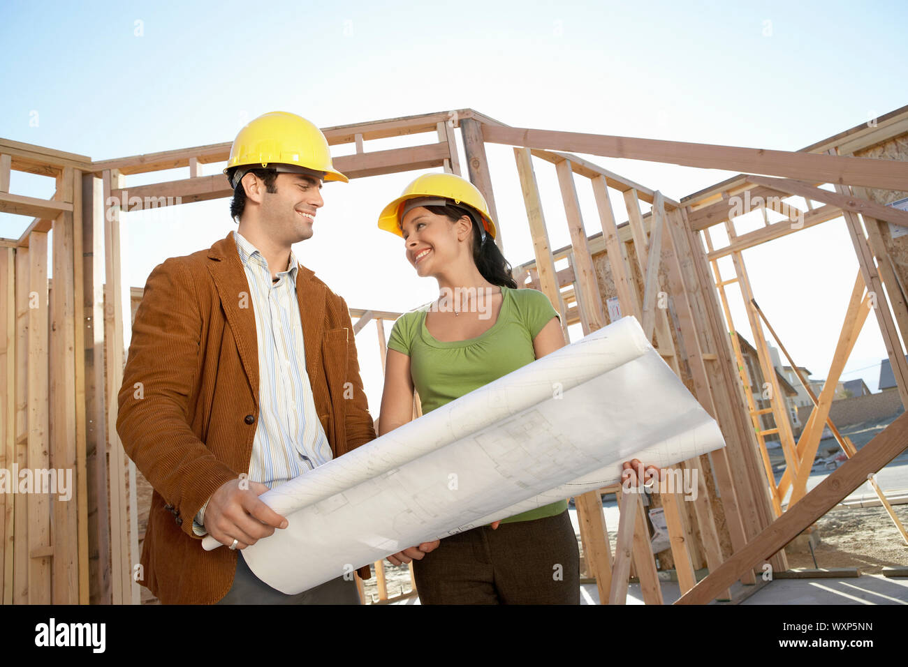 Couple Having Their House Built Stock Photo - Alamy