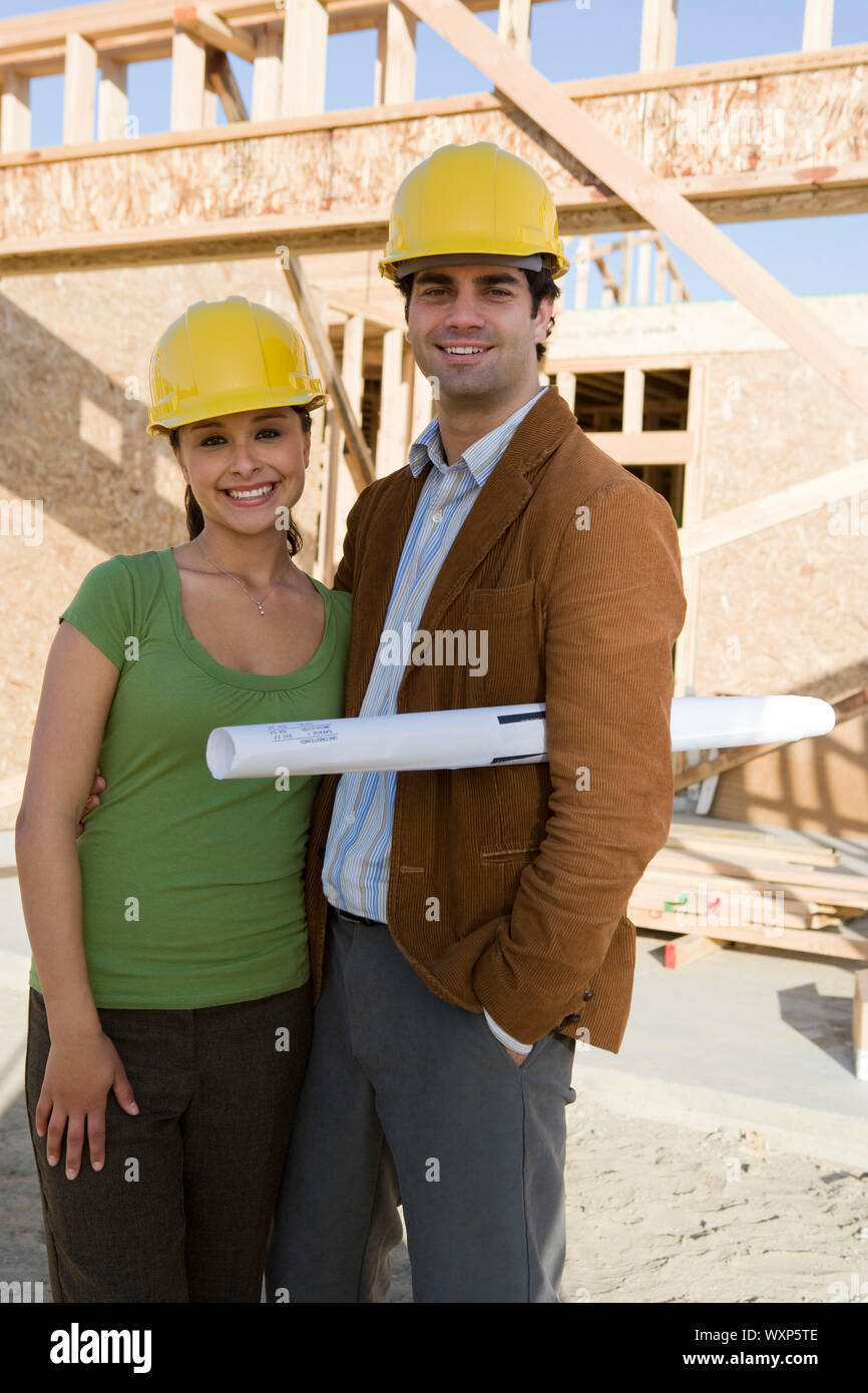 Young couple in construction site Stock Photo - Alamy
