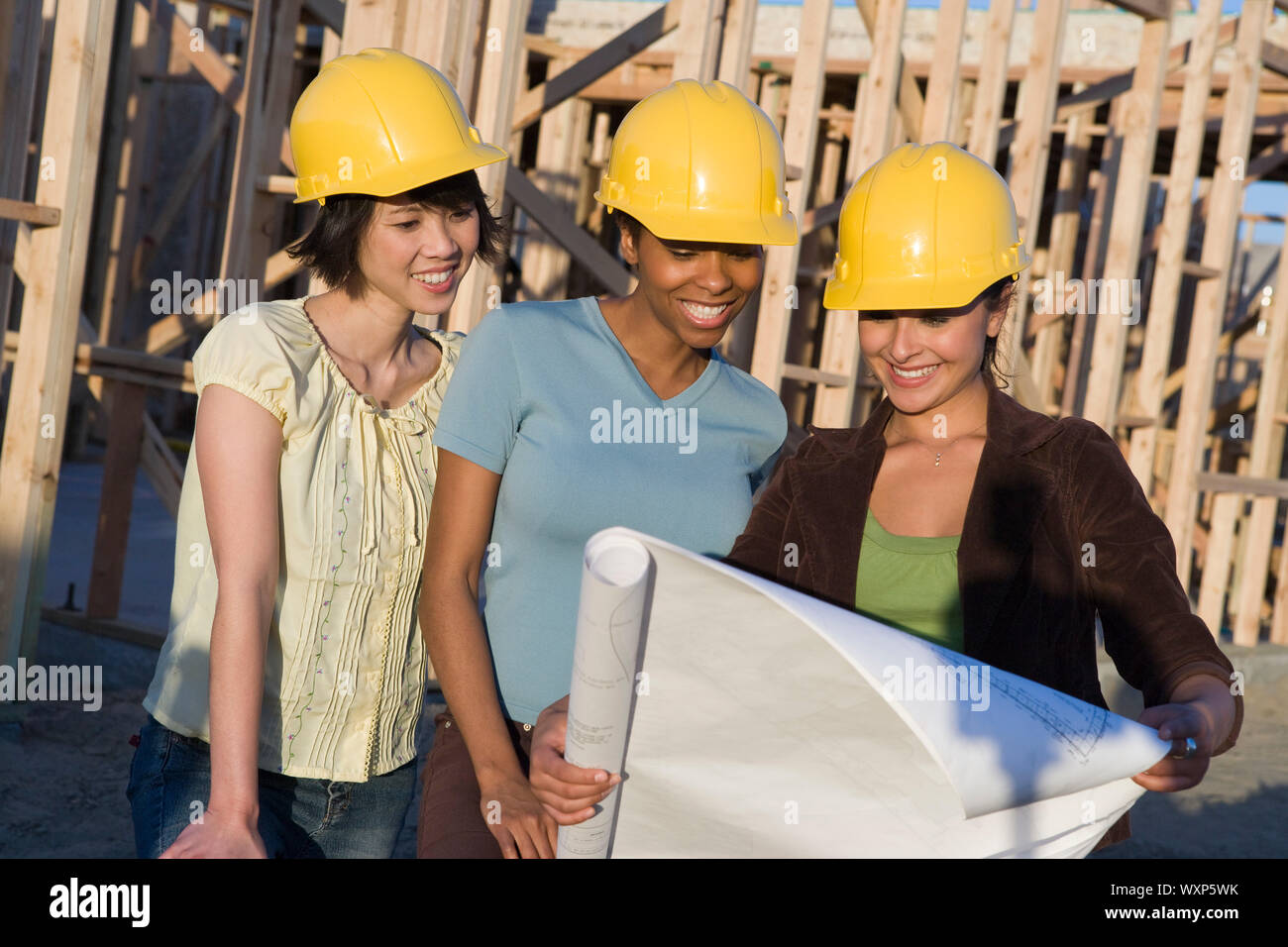 Young women in construction site Stock Photo - Alamy