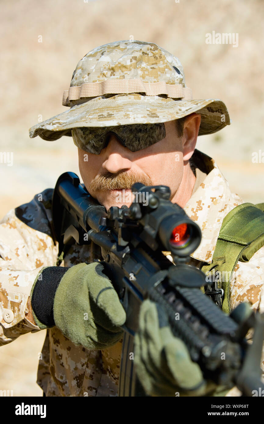 Soldier Aiming Rifle Stock Photo - Alamy