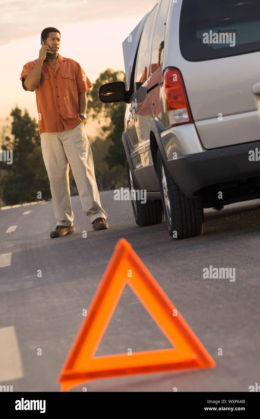 Men calling out of car hi-res stock photography and images - Alamy