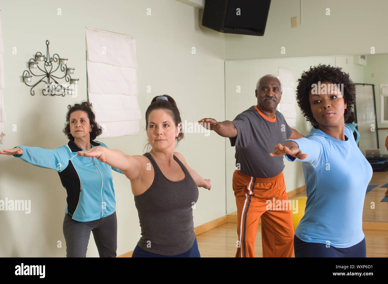 Stretching in Yoga Class Stock Photo - Alamy