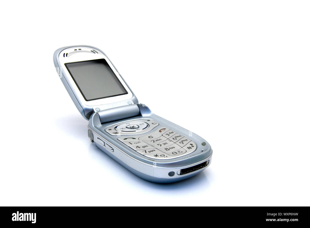 A clamshell mobile phone on a white background Stock Photo - Alamy