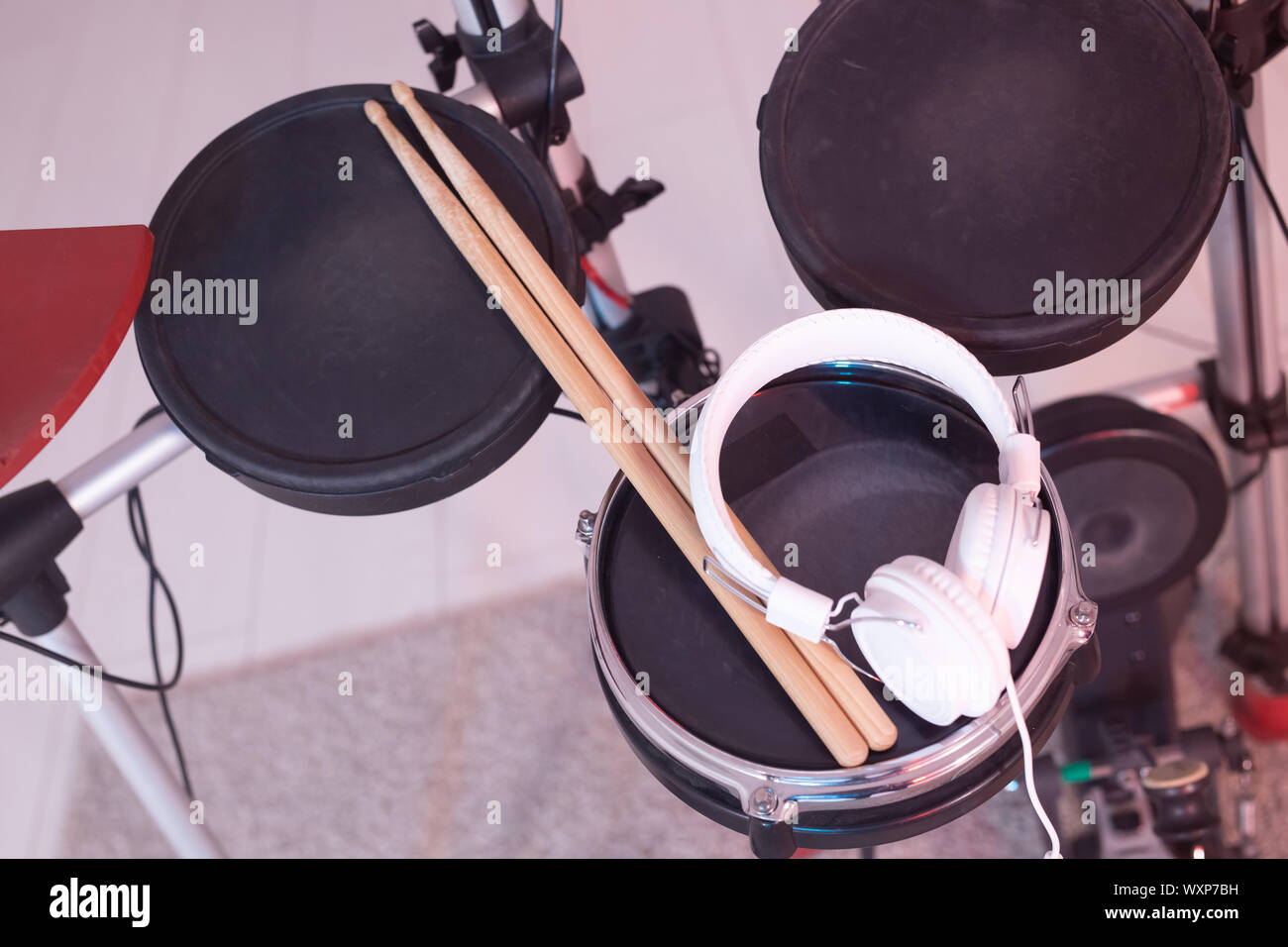 Musical instruments, hobby and music concept - headphone, drumsticks on ...
