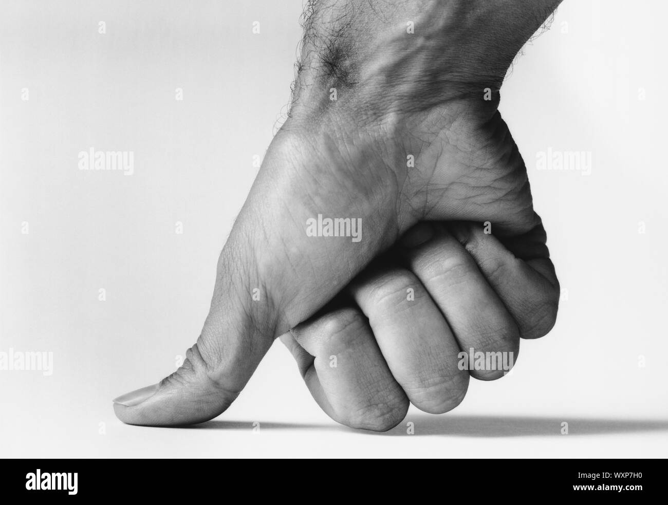 Thumb Pressing Down Stock Photo - Alamy