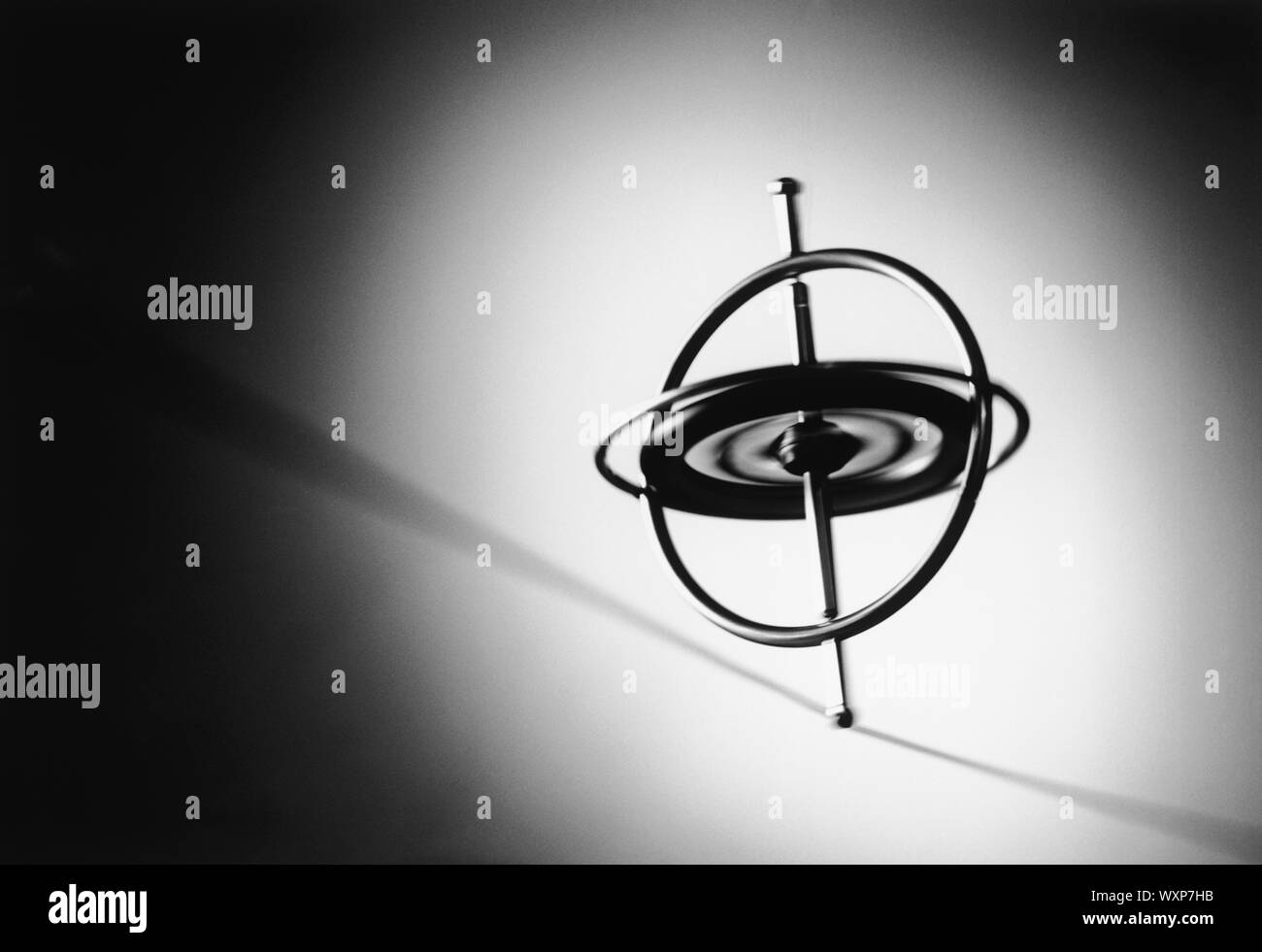 Spinning Gyroscope on Wire Stock Photo - Alamy