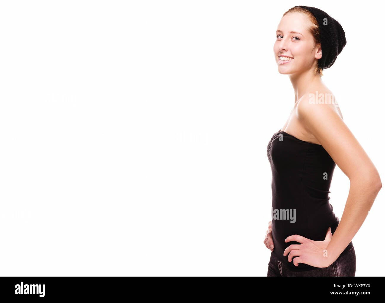 cute happy girl wearing a black cap on white background Stock Photo - Alamy