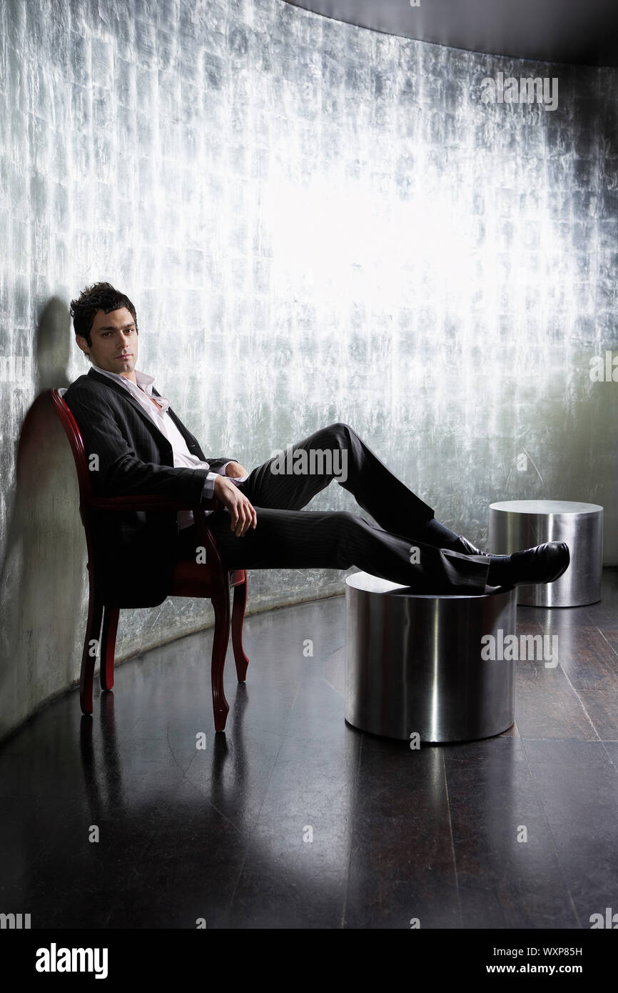 Human footstool hi-res stock photography and images - Alamy