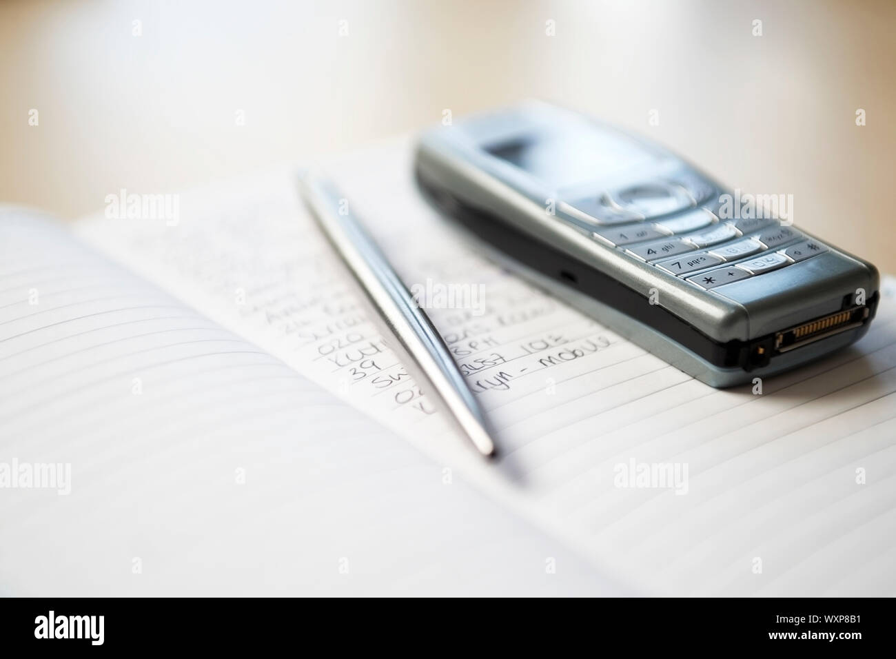 Cell Phone and Address Book Stock Photo - Alamy