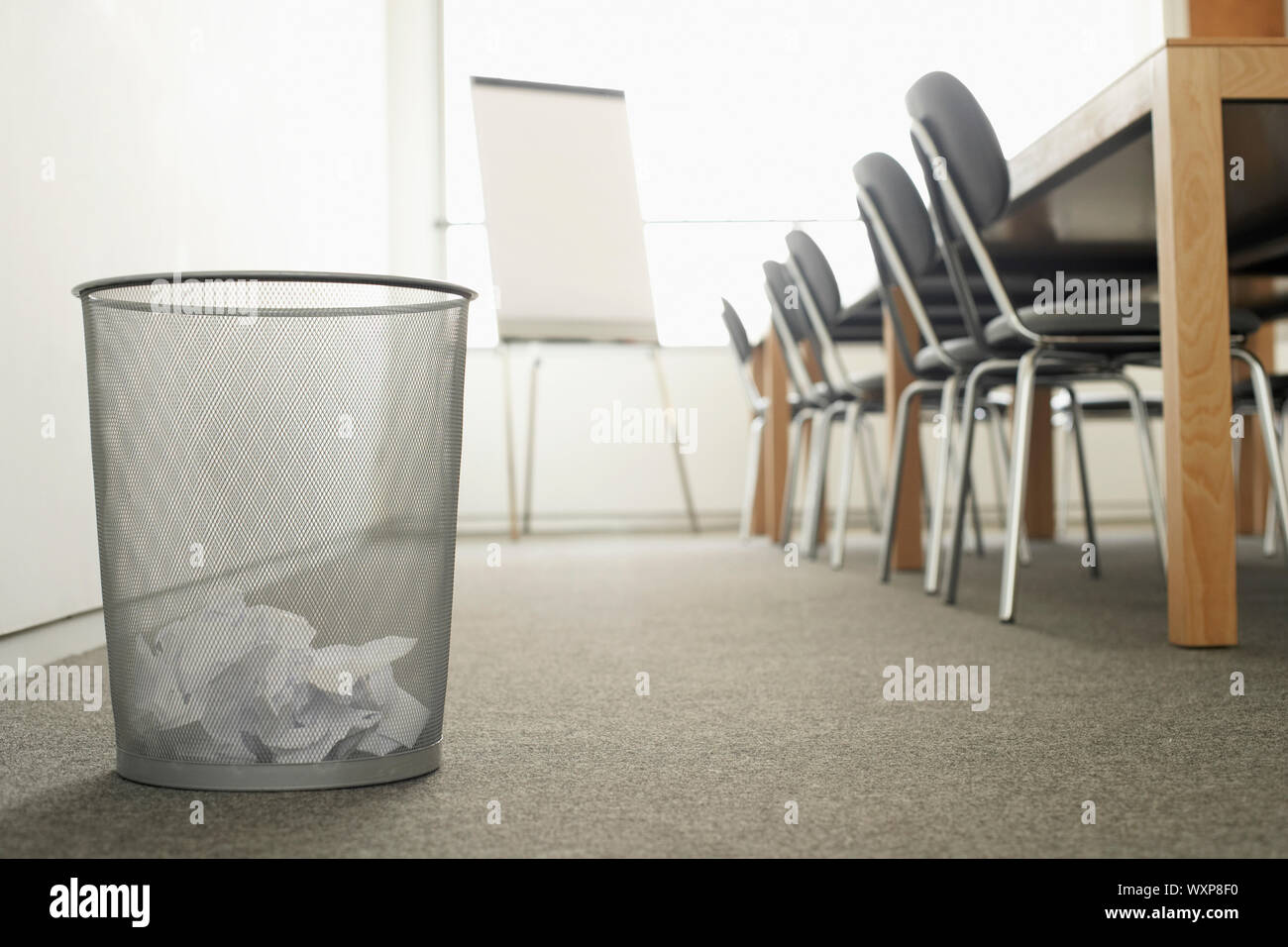 Trash Can in Meeting Room Stock Photo - Alamy