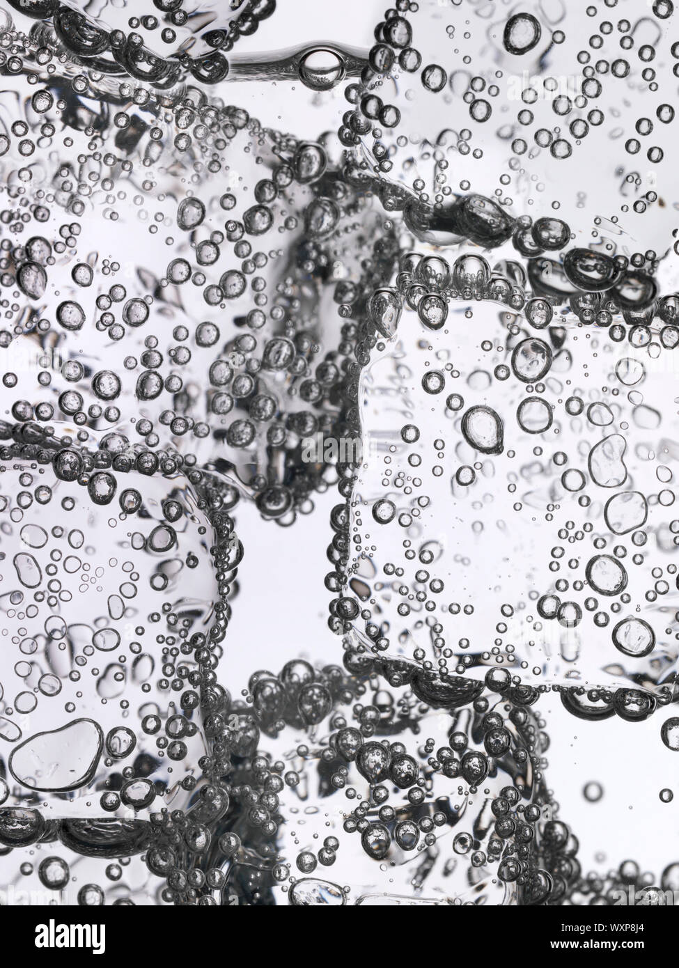 Ice cubes with water bubbles close-up Stock Photo - Alamy