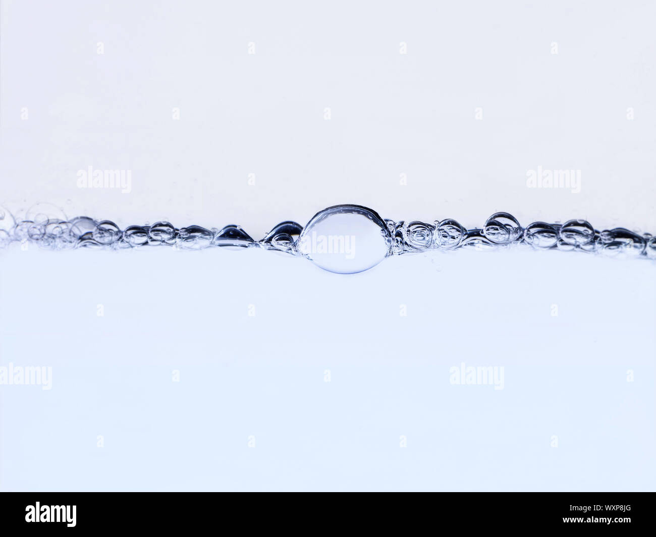 Bubbles on surface of water Stock Photo - Alamy