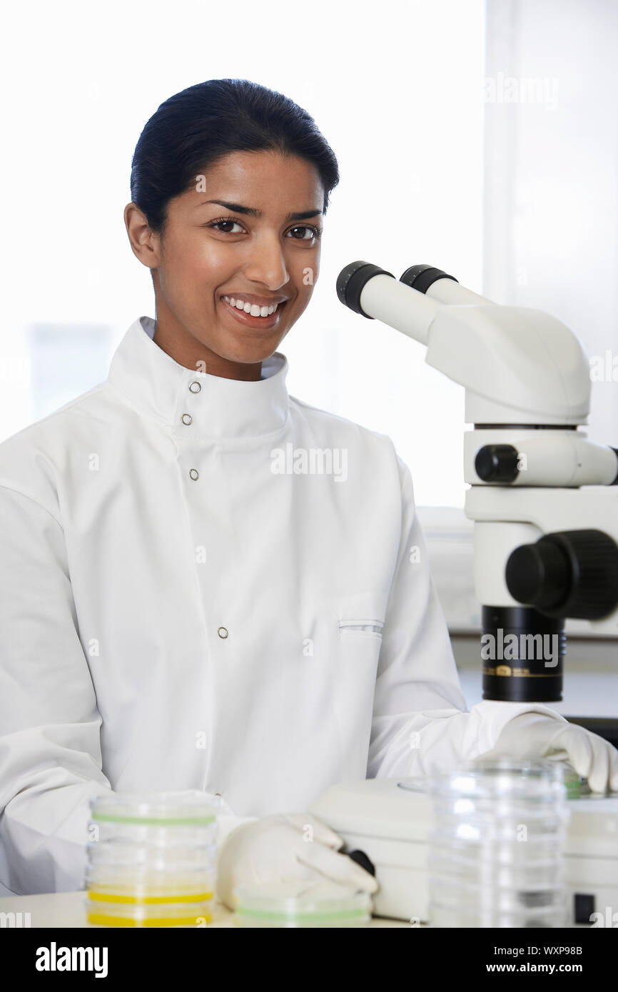 Indian women working microscope hi-res stock photography and images - Alamy