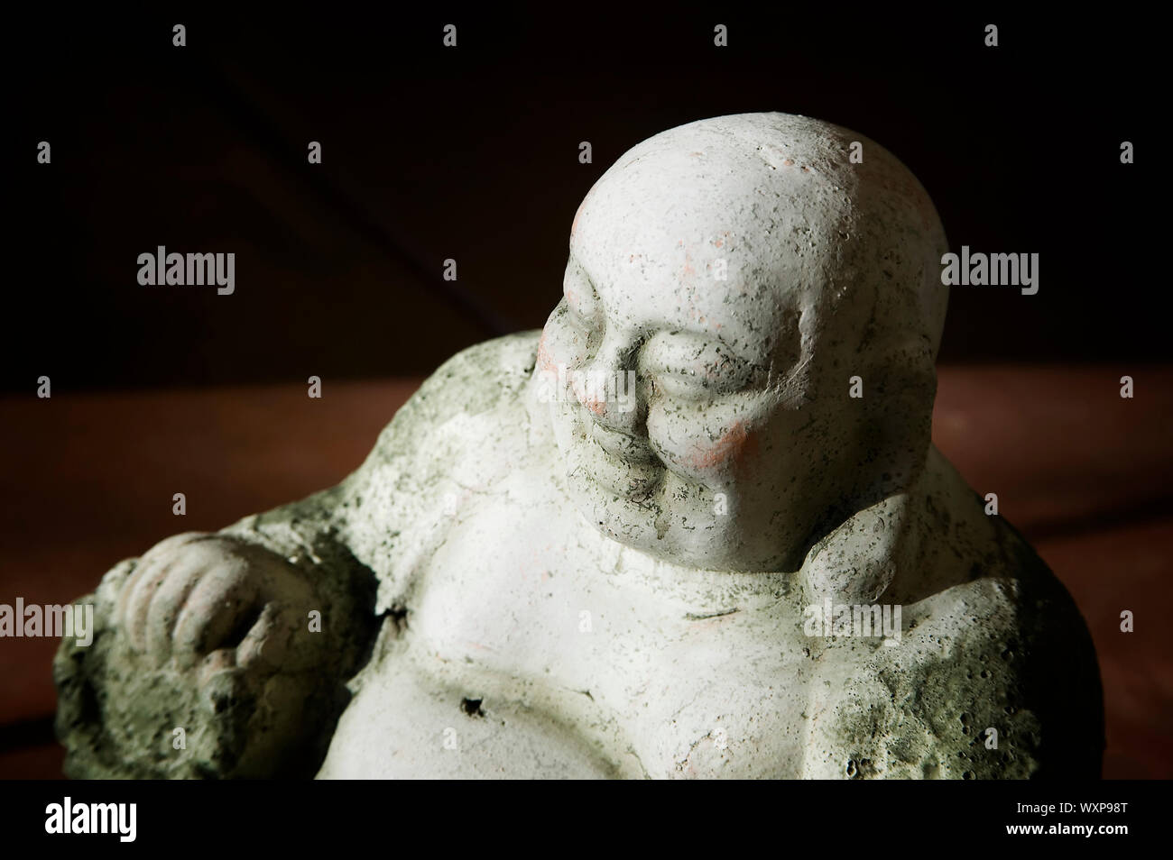 Concrete Buddha Statue in bright Afternoon Light Stock Photo - Alamy