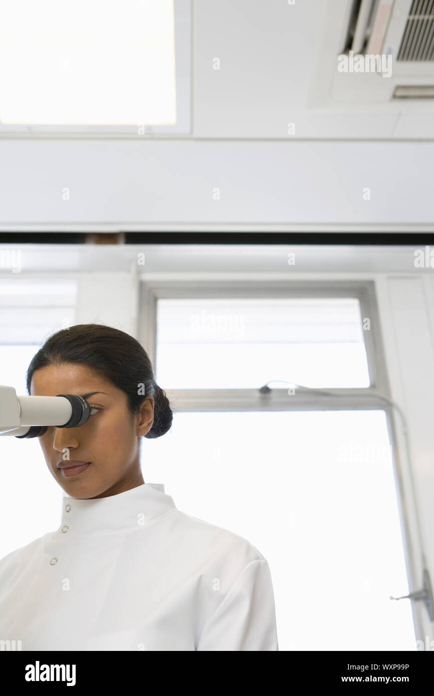 Indian women working microscope hi-res stock photography and images - Alamy