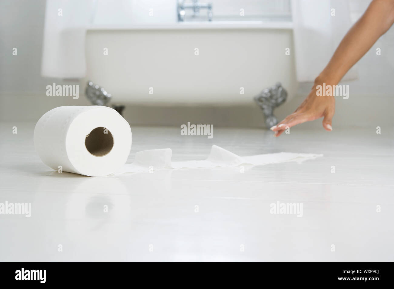 Woman reaching tissue hi-res stock photography and images - Alamy