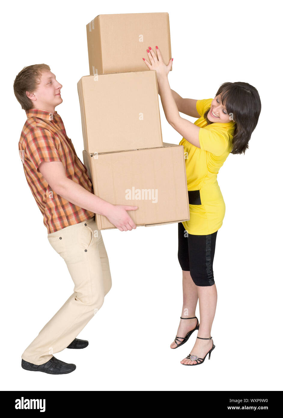 Girl loads the young man with cardboard boxes Stock Photo - Alamy