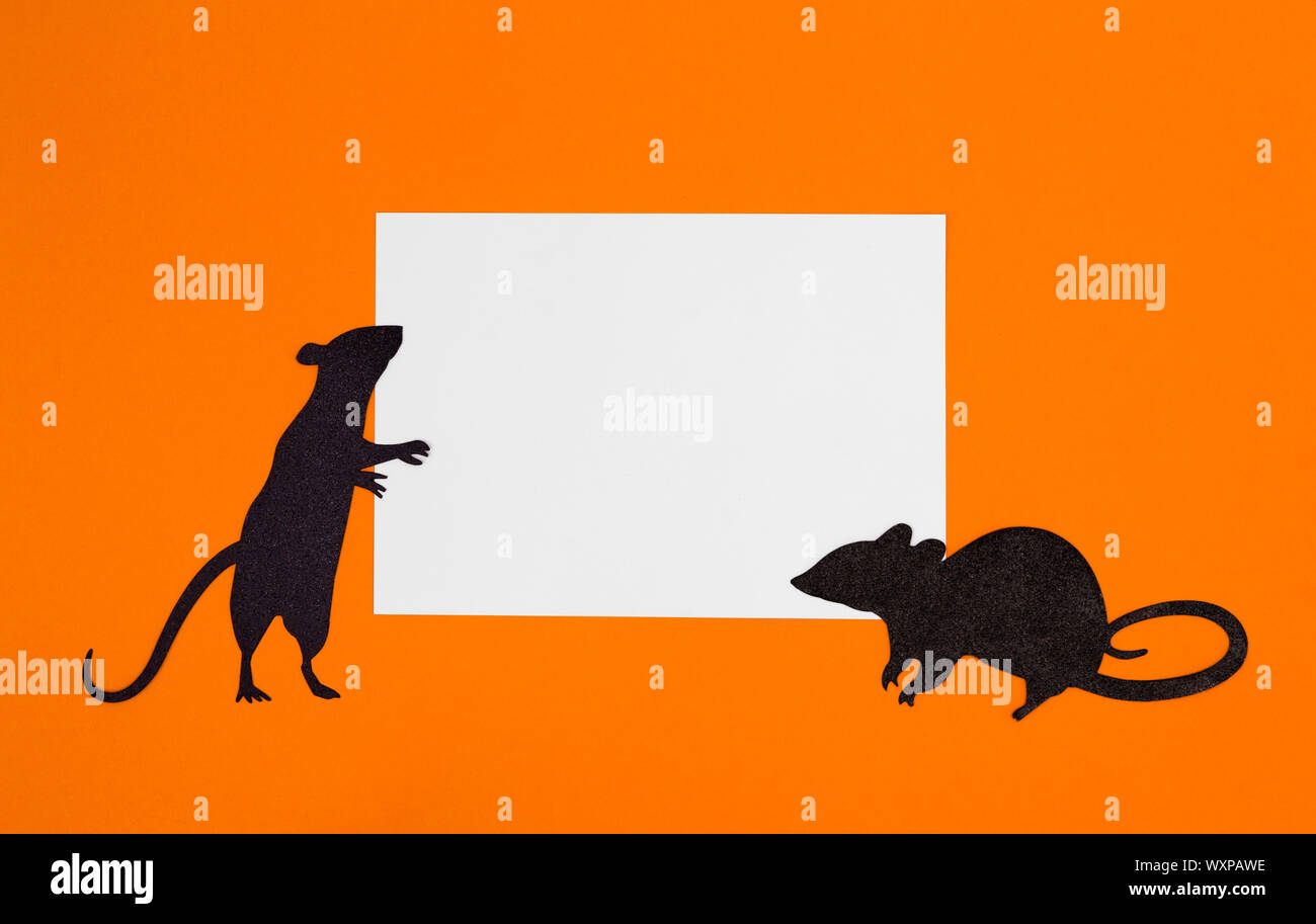 Sheet of paper at orange background with silhouettes of mice Stock ...