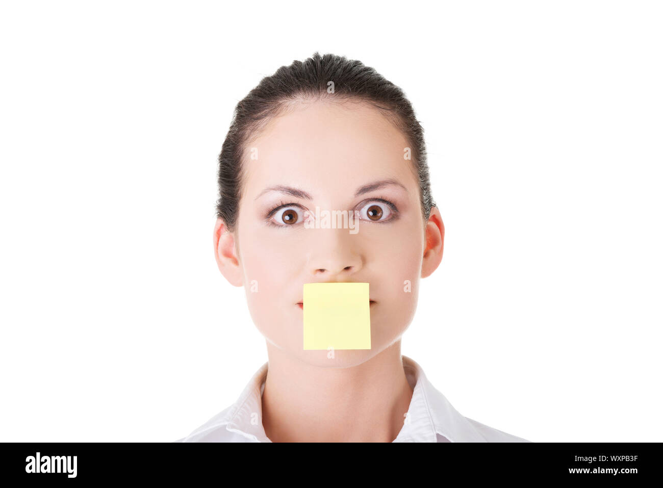 Attractive woman's face with empty card on lips. Isolated on white ...
