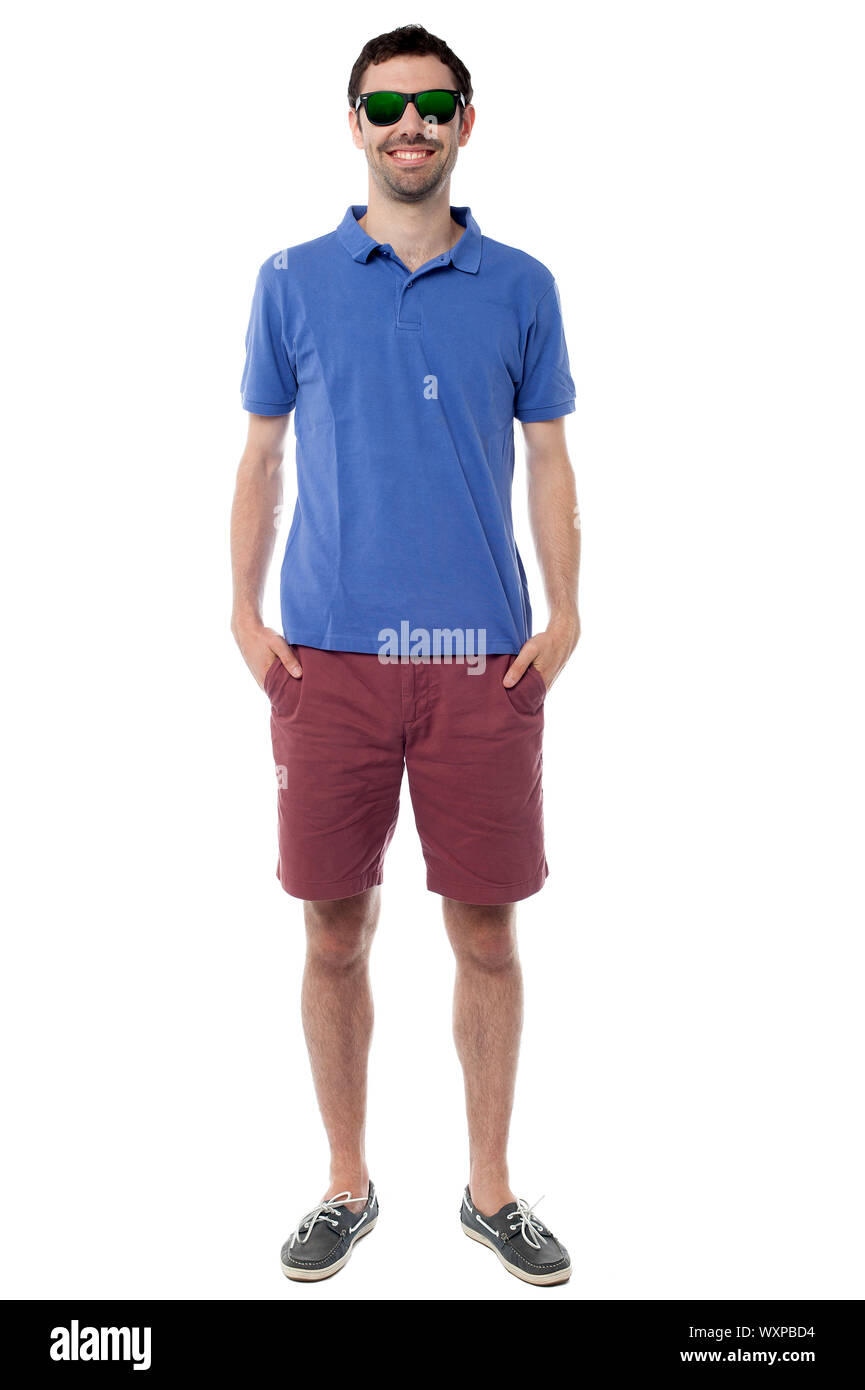 Studio shot of a young man posing casually Stock Photo - Alamy