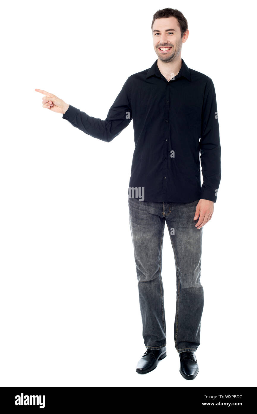 Smart guy pointing towards something Stock Photo - Alamy