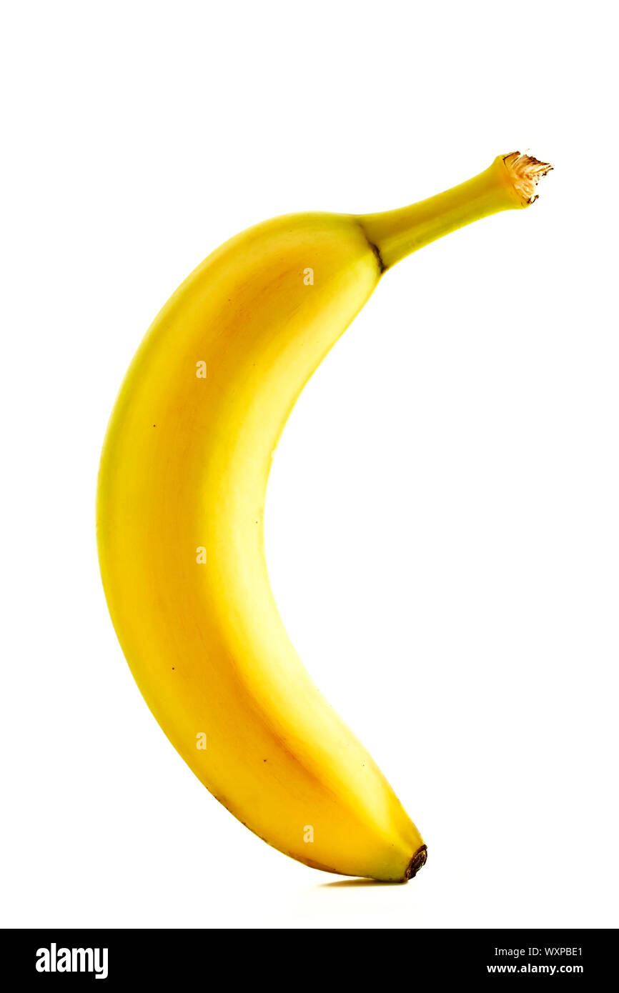 one banana standing on white background Stock Photo - Alamy