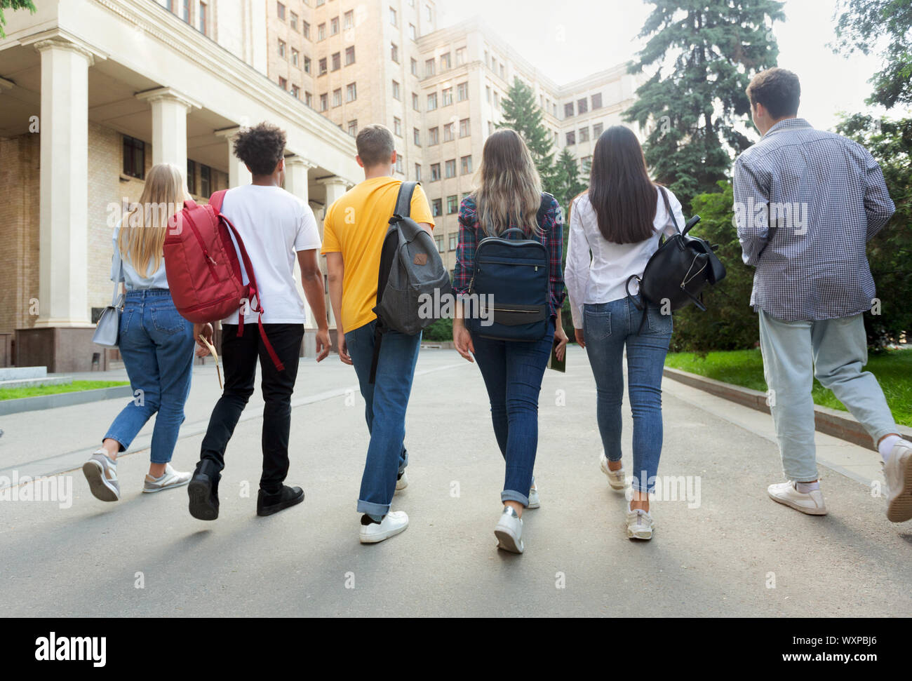 Back view group males hi-res stock photography and images - Alamy