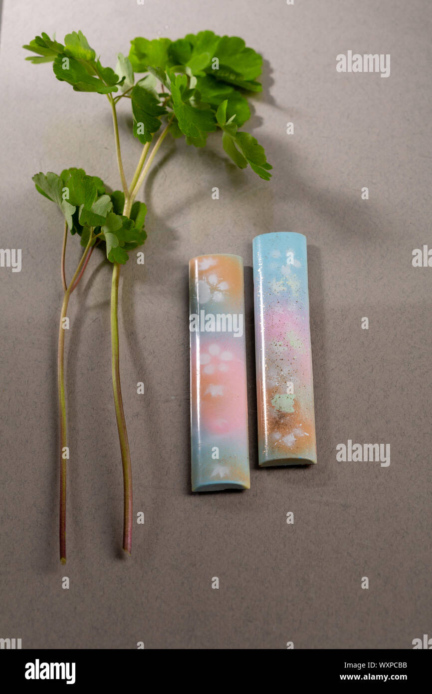 Flora bonbons and leaves, candy concept Stock Photo - Alamy