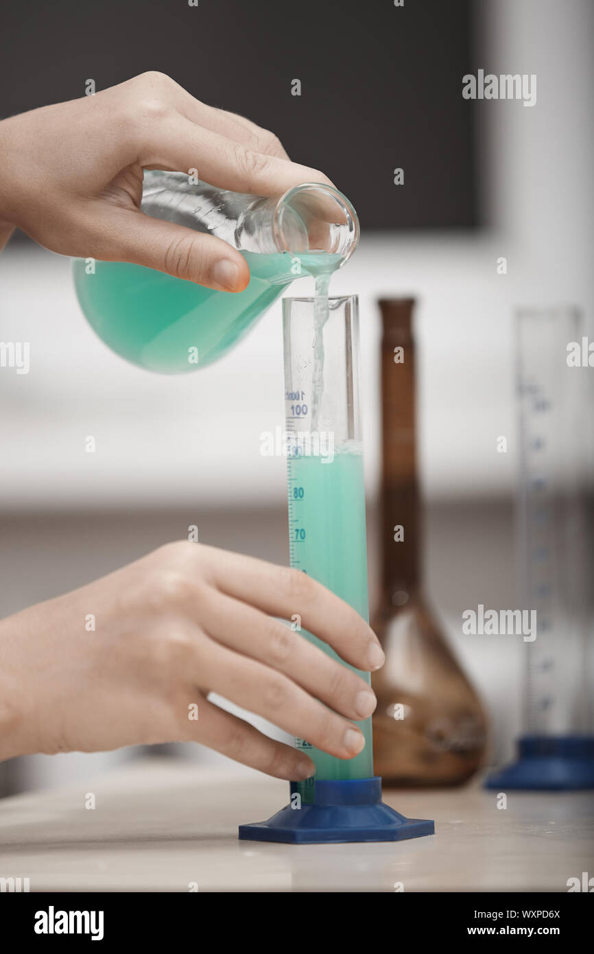 Human hands working in chemical laboratory Stock Photo - Alamy