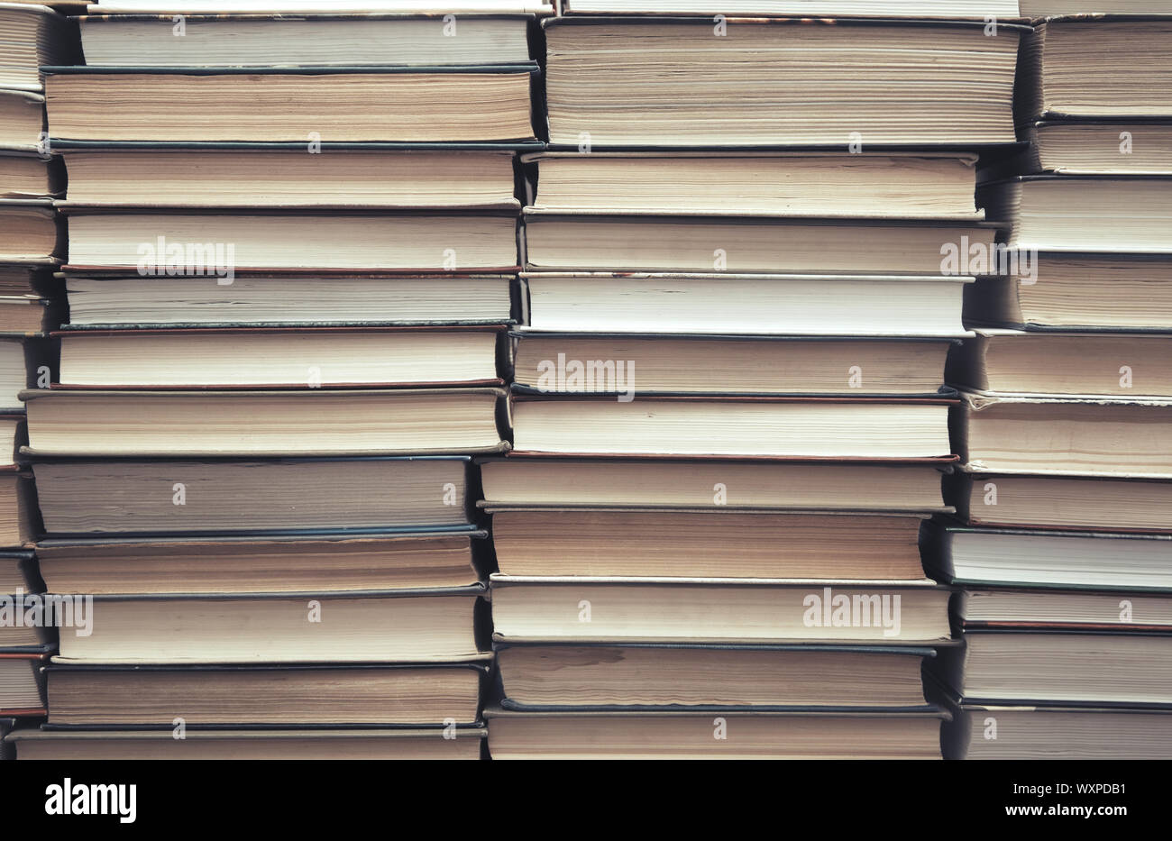 Rows and columns of numerous books Stock Photo - Alamy