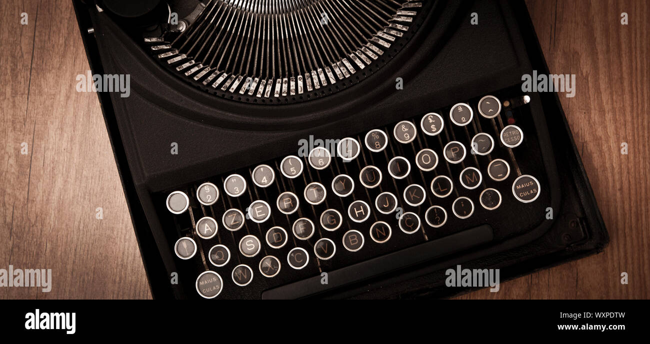 Top view of a vintage typewriter over a wood floor Stock Photo - Alamy