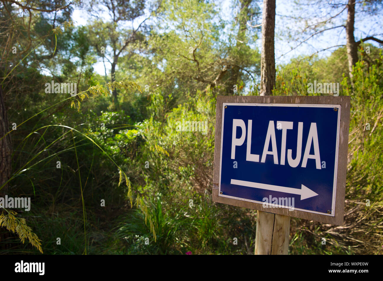 Menorca track blue sign with Platja or beach arrow in Mediterranean ...