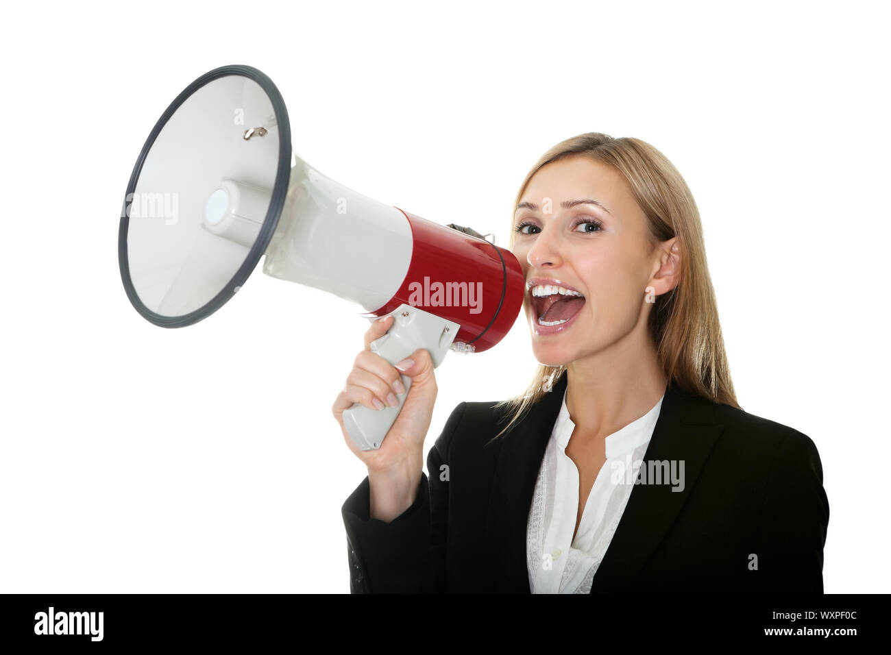 Excited young business woman screaming into a megaphone on white ...