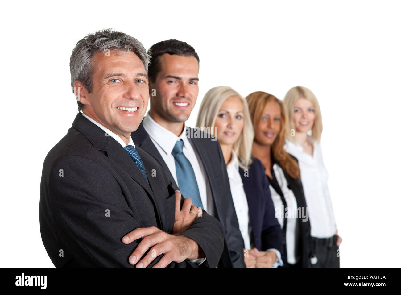 Business colleagues standing in a line isolated on white background ...