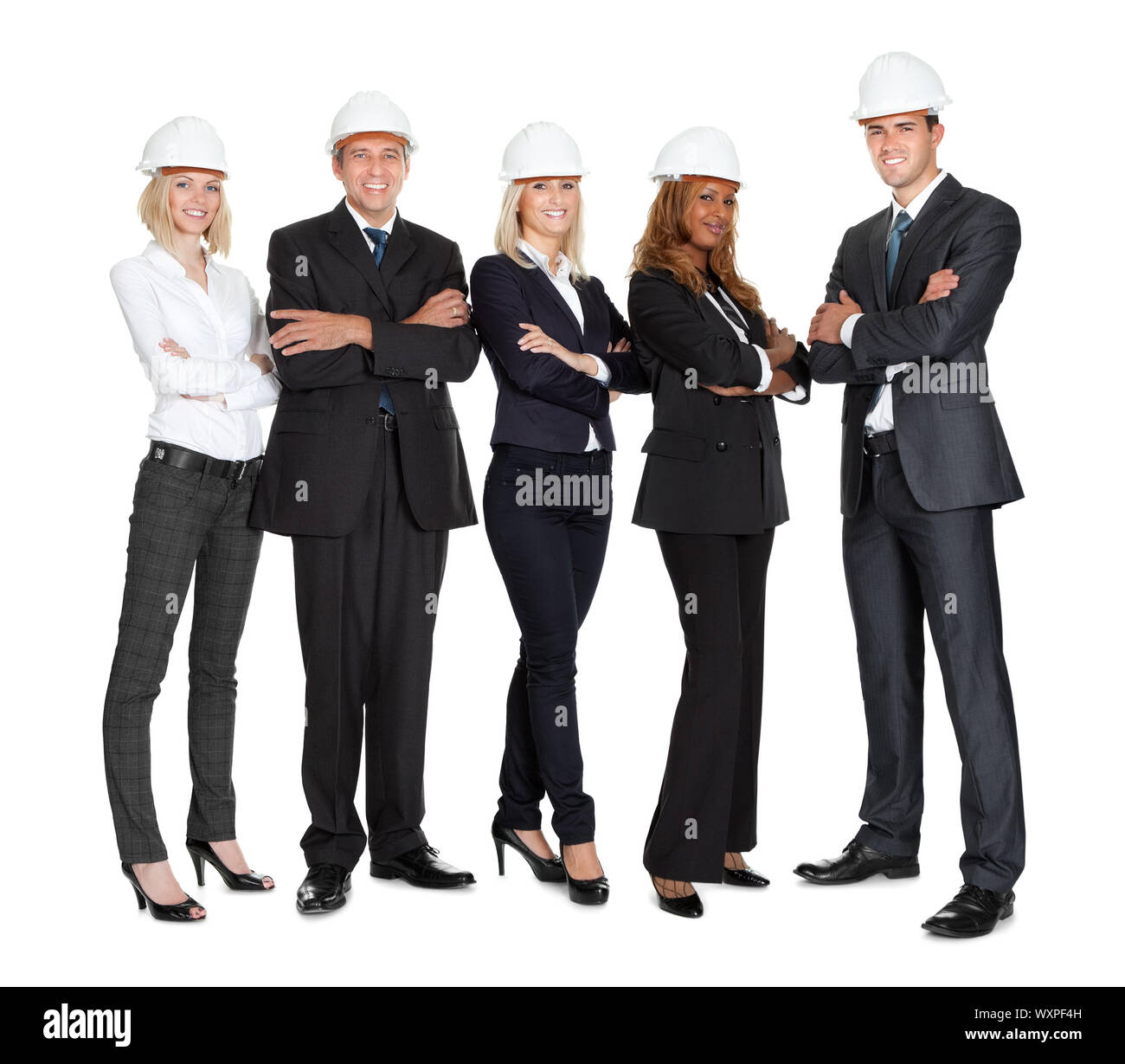 Team of successful construction workers isolated on white background ...