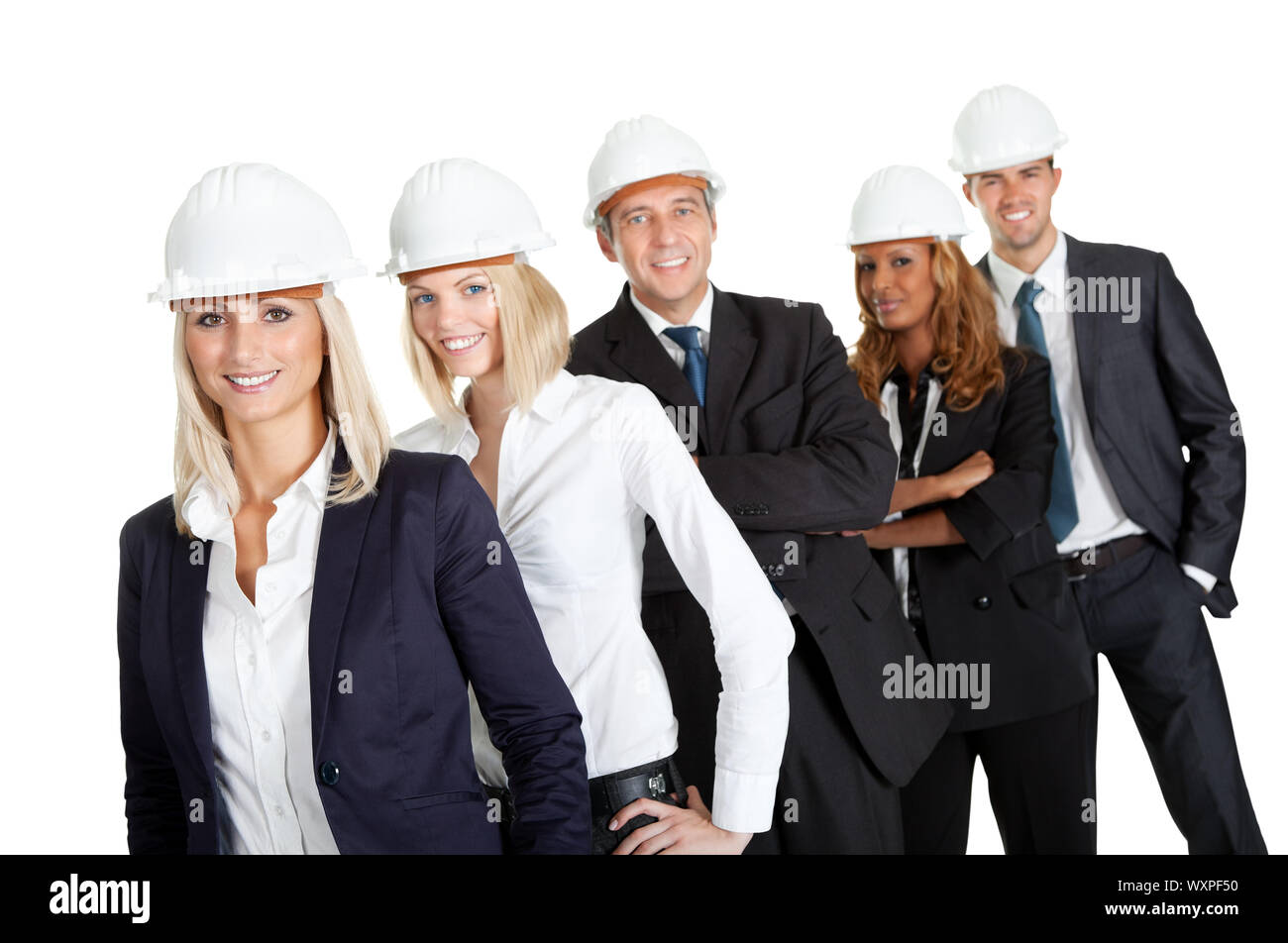 Portrait of group of construction workers standing in line isolated on ...