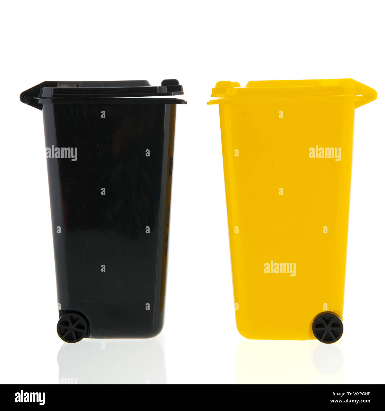 Black and yellow waste bin isolated over white background Stock Photo ...