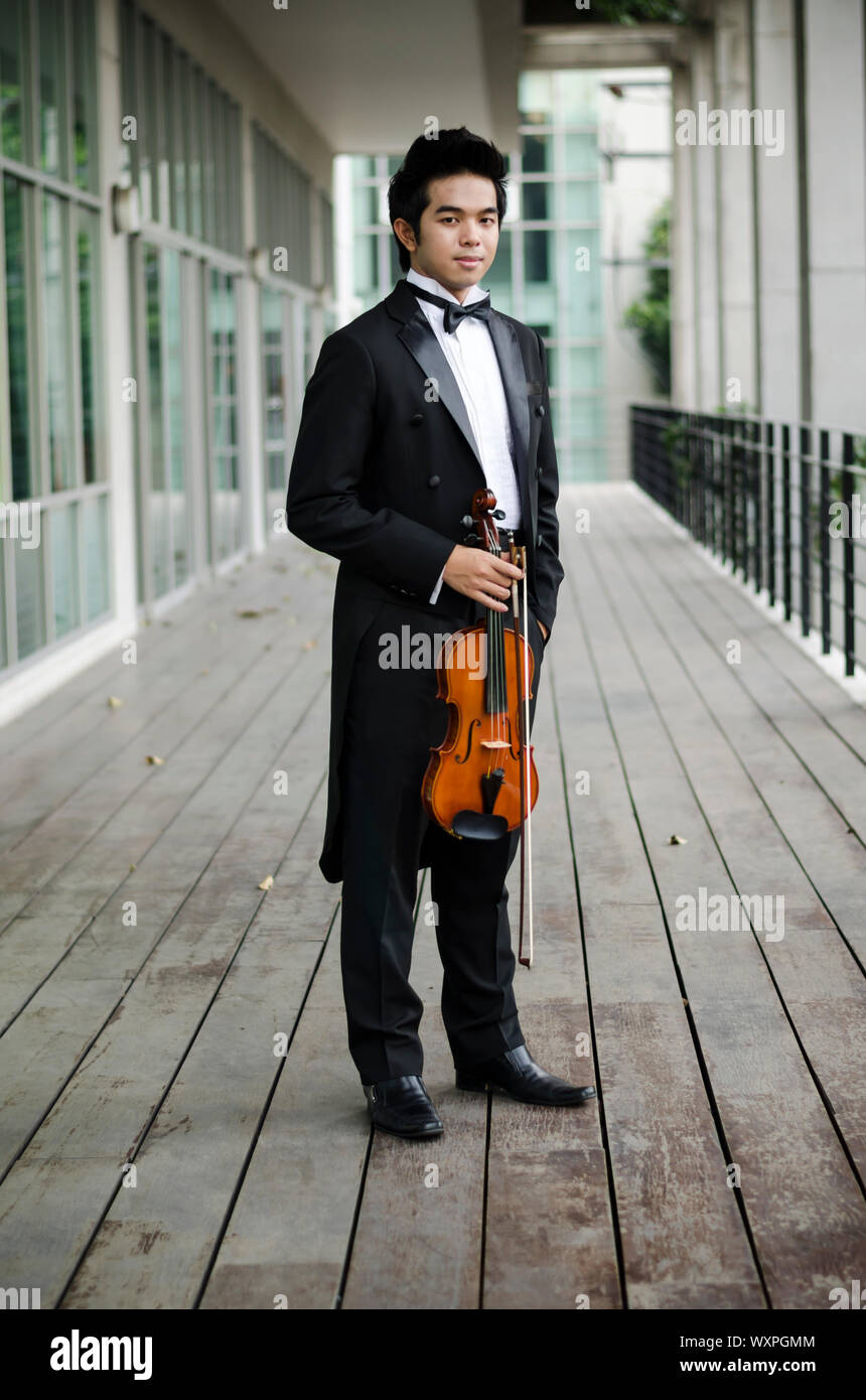 Thailand asia man with his violin he is a soloist Stock Photo - Alamy