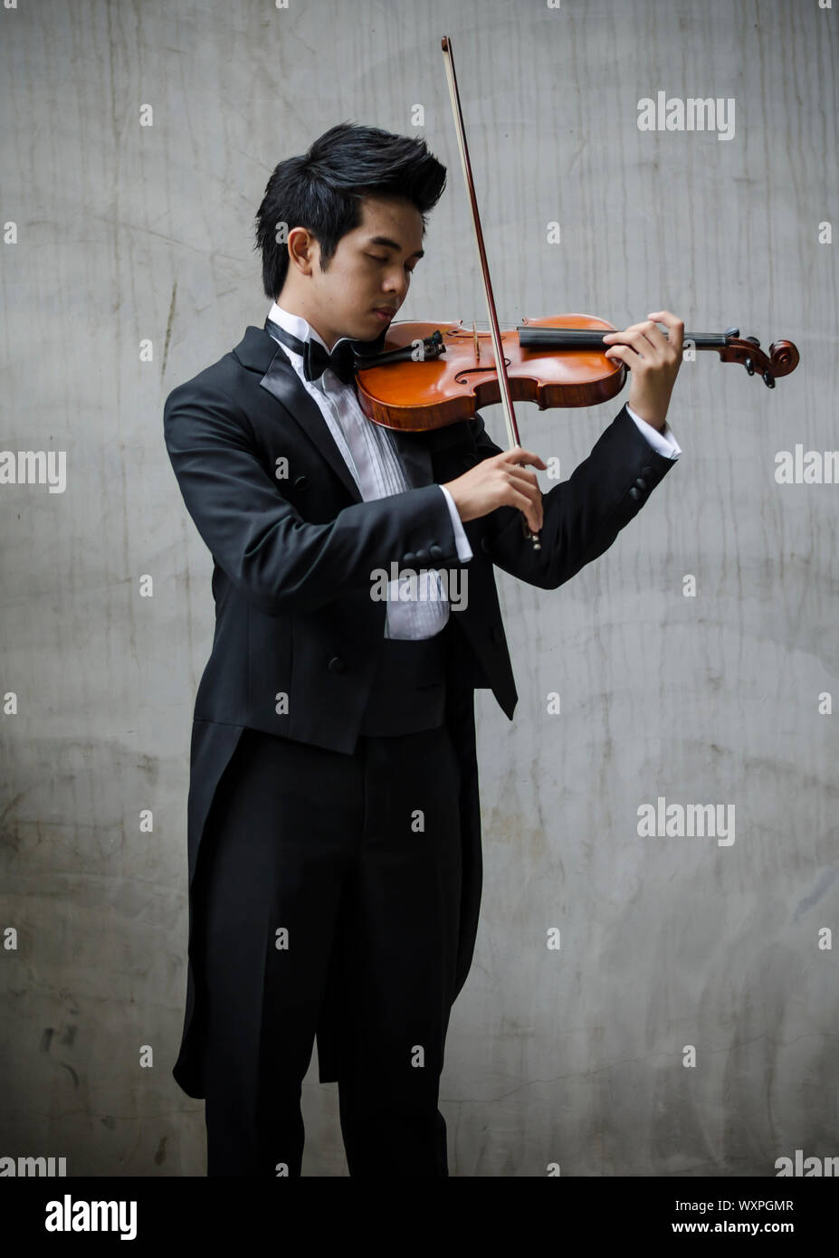 Thailand asia man with his violin he is a soloist Stock Photo - Alamy