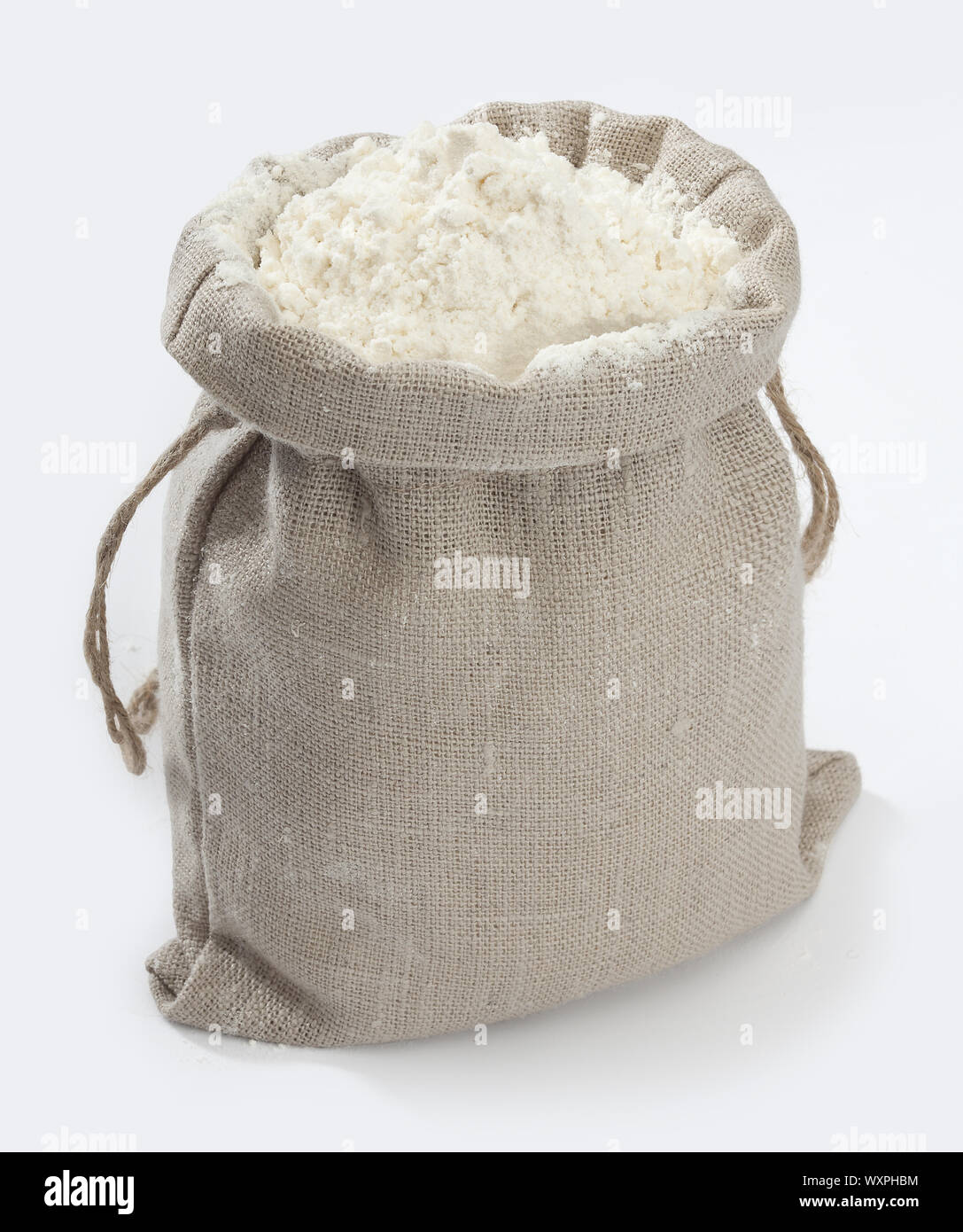 Isolated small sack with white flour on the white background Stock ...