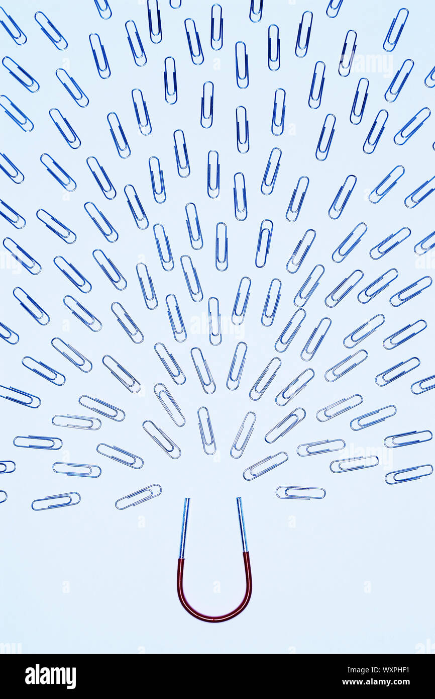 Magnet and Paper Clips Stock Photo - Alamy