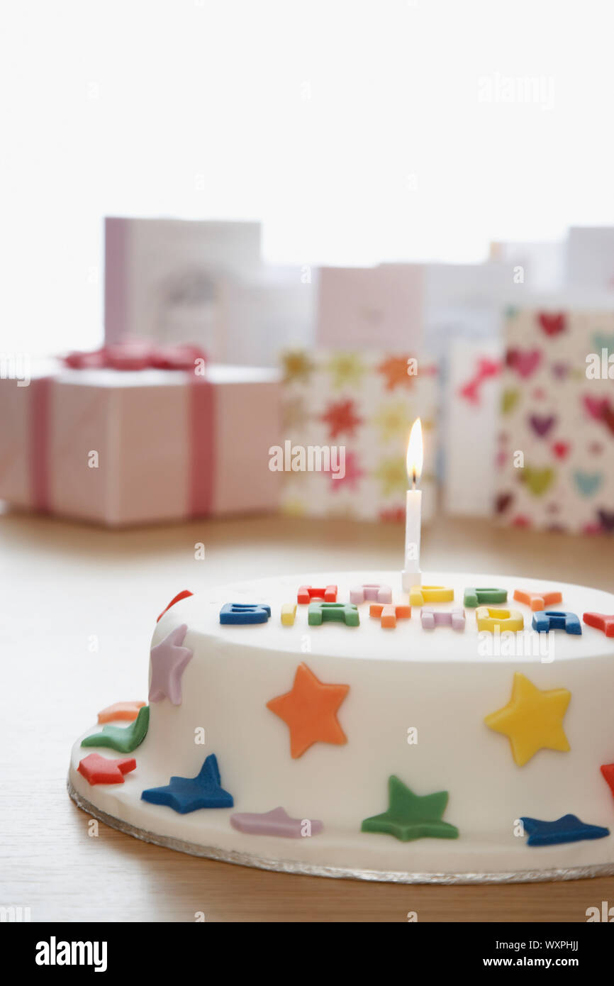 Birthday Cake with Cards and Gift Stock Photo - Alamy