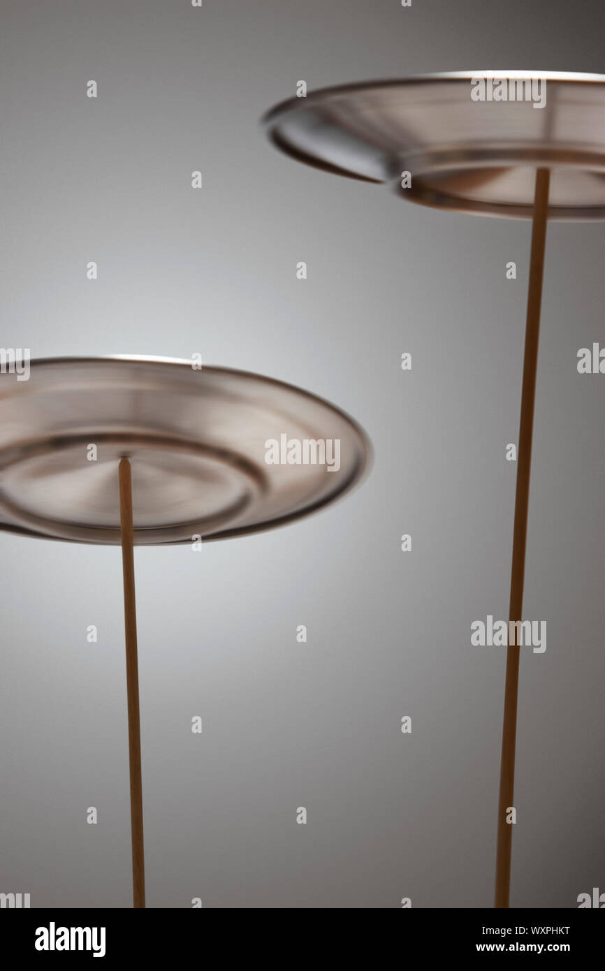Spinning plates sticks hi-res stock photography and images - Alamy