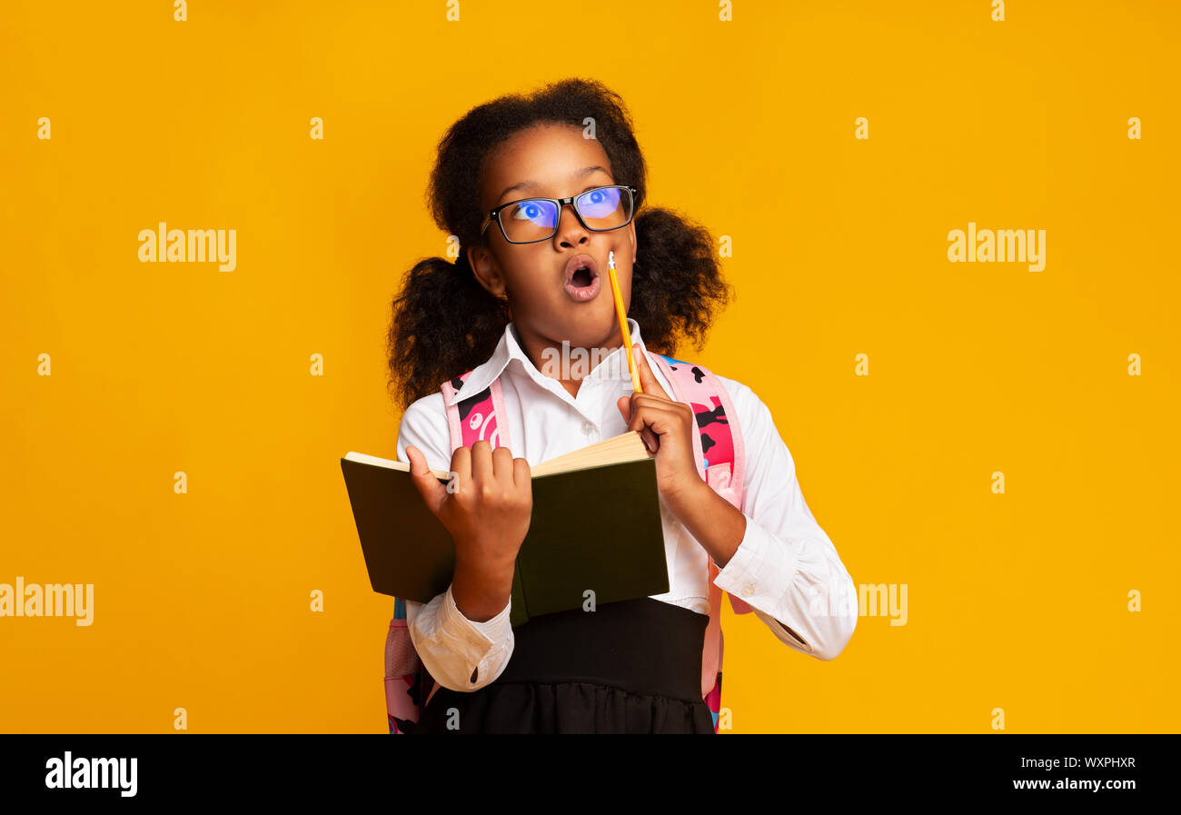 Schoolgirl doing homework hi-res stock photography and images - Alamy