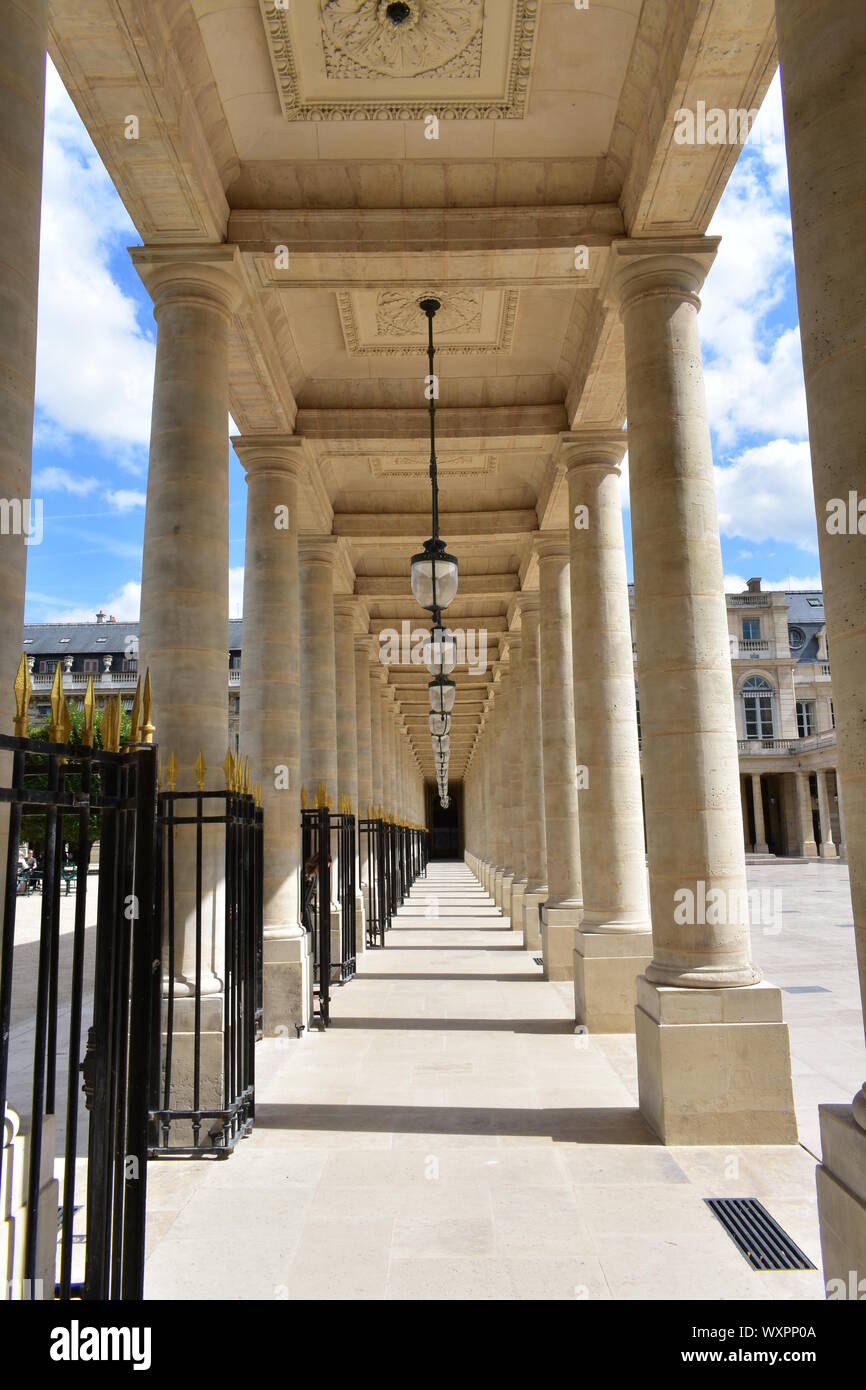 The Palais Royal, view of corridor, columns and hanging lamps in the ...