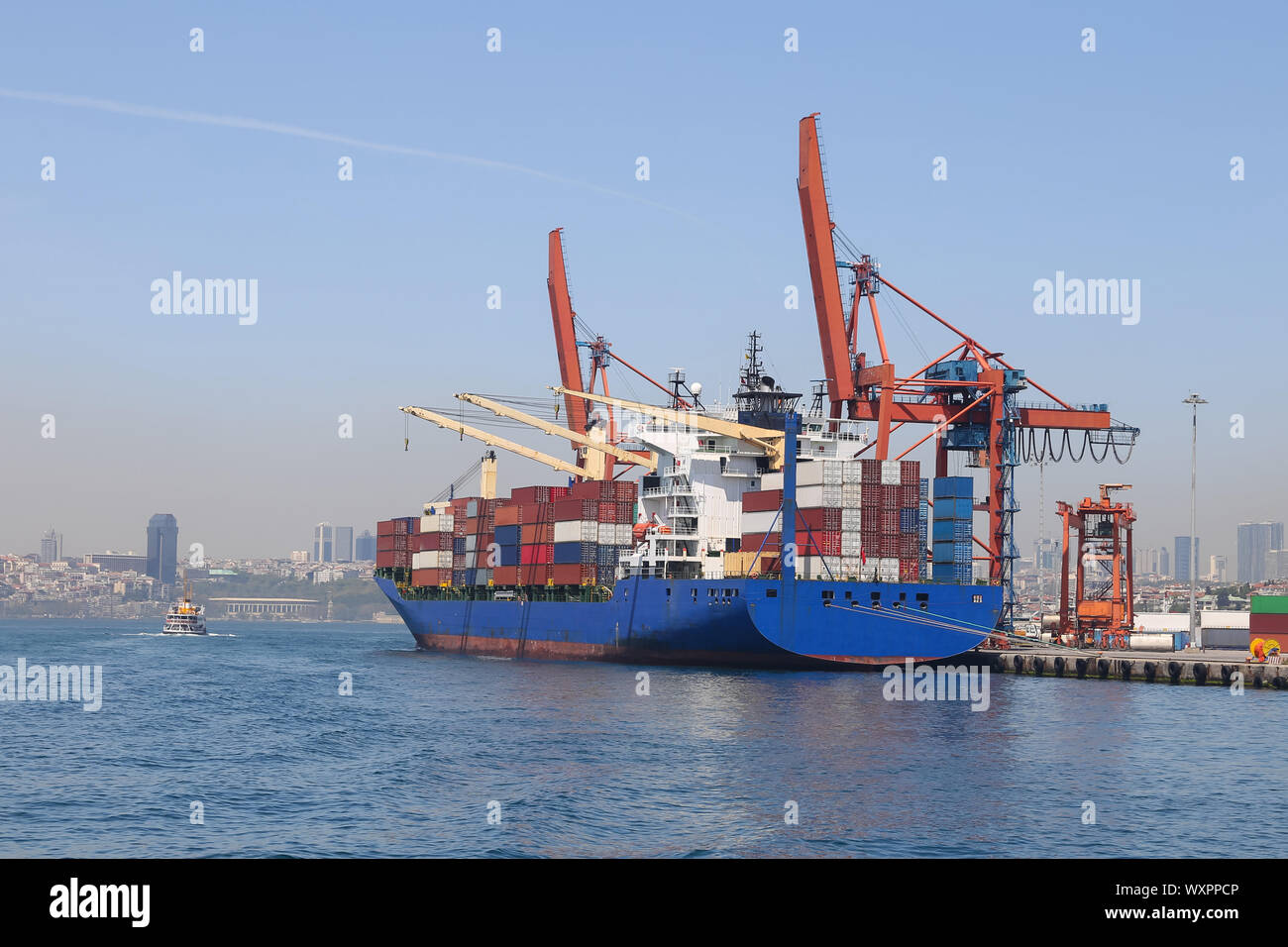 Container Ship is loading in a port Stock Photo - Alamy