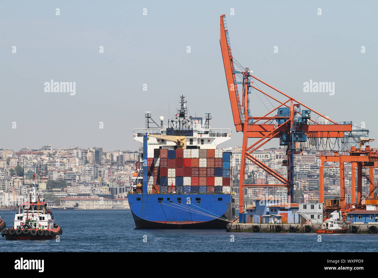 Container Ship is loading in a port Stock Photo - Alamy