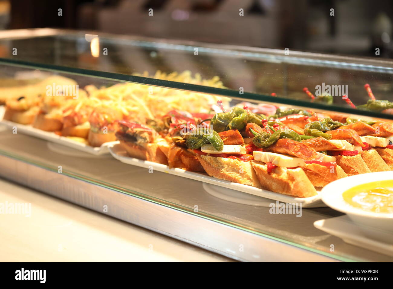 Spanish food restaurant tapas display Stock Photo - Alamy