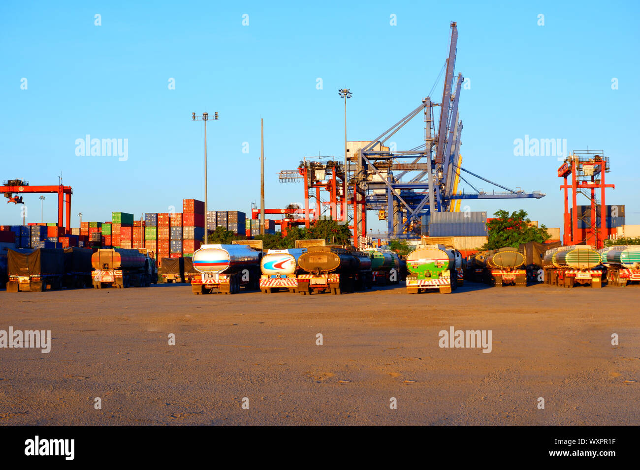 Ports and cranes used to load products Stock Photo - Alamy