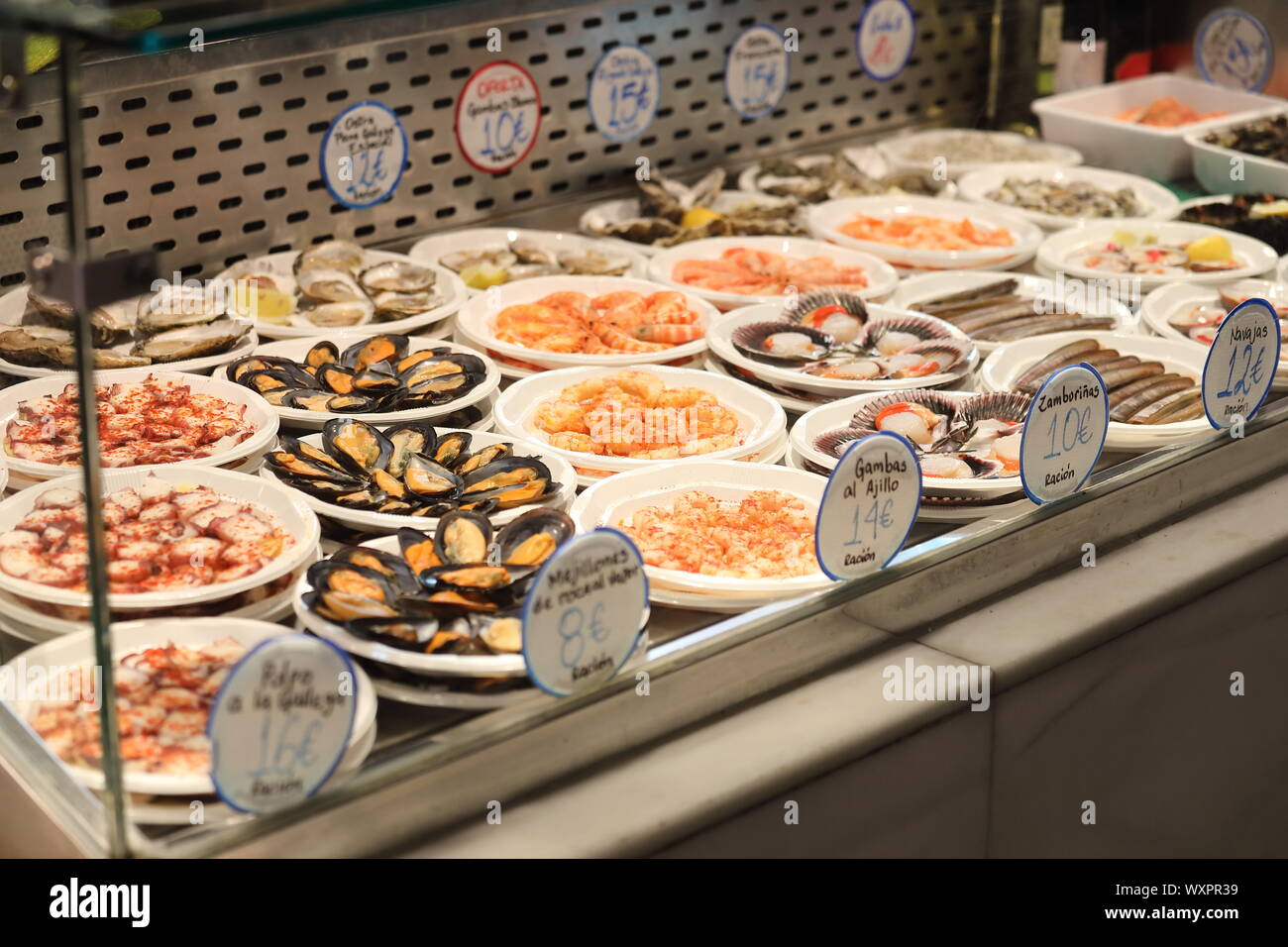 Spanish food tapas display at Mercado de San Miguel market Madrid Spain ...